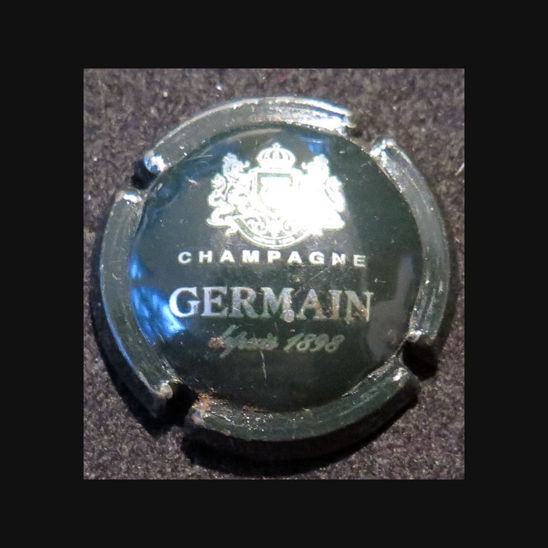 Capsule Muselet de bouteille de champagne GERMAIN n° 33d noir et argent