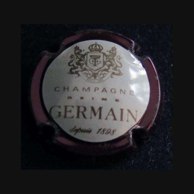 Capsule Muselet de bouteille de champagne GERMAIN H. n° 28 contour marron